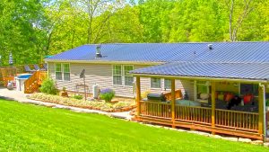 Take a Look at This Jaw-Dropping Mobile Home with a Above Ground Pool!